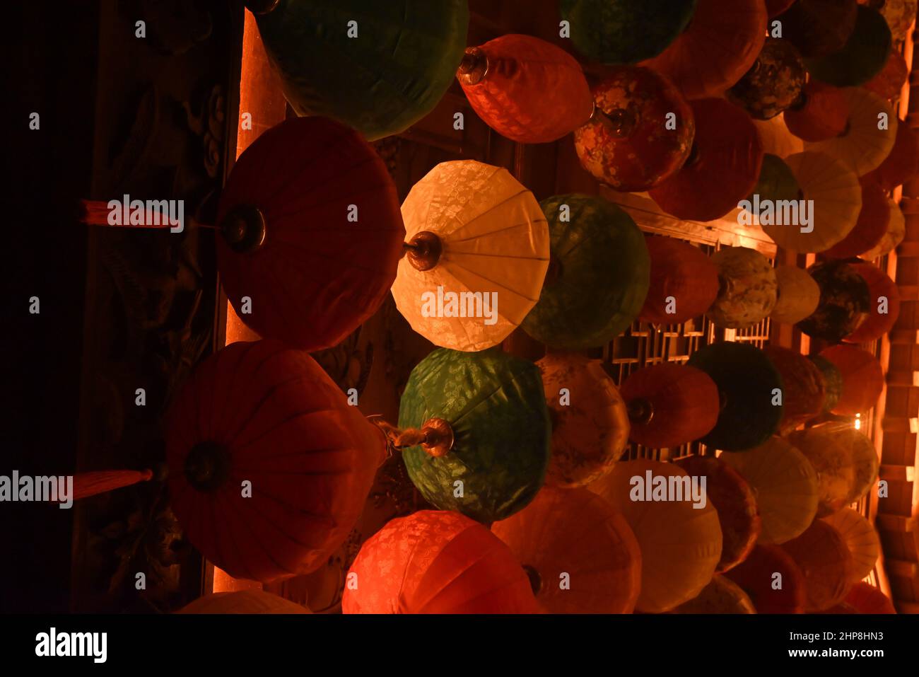 View of traditional Chinese lanterns hanging in the darkness Stock ...
