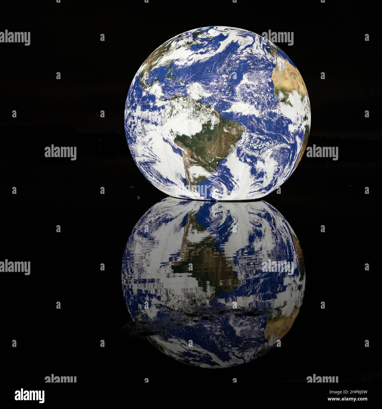 Beautiful view of an earth reflected in water Stock Photo - Alamy