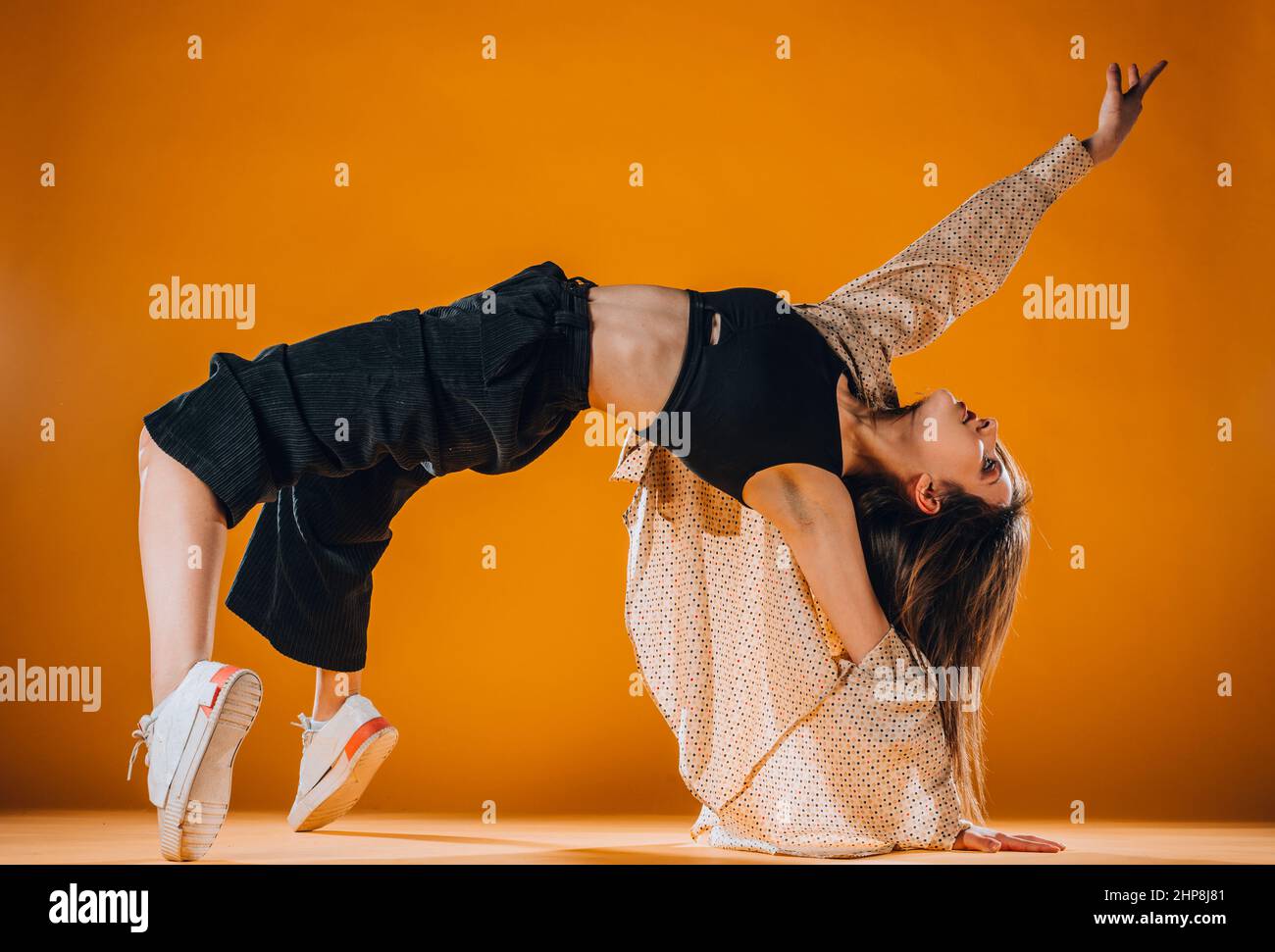 Beautiful girl performing a contemporary dance routine Stock Photo - Alamy