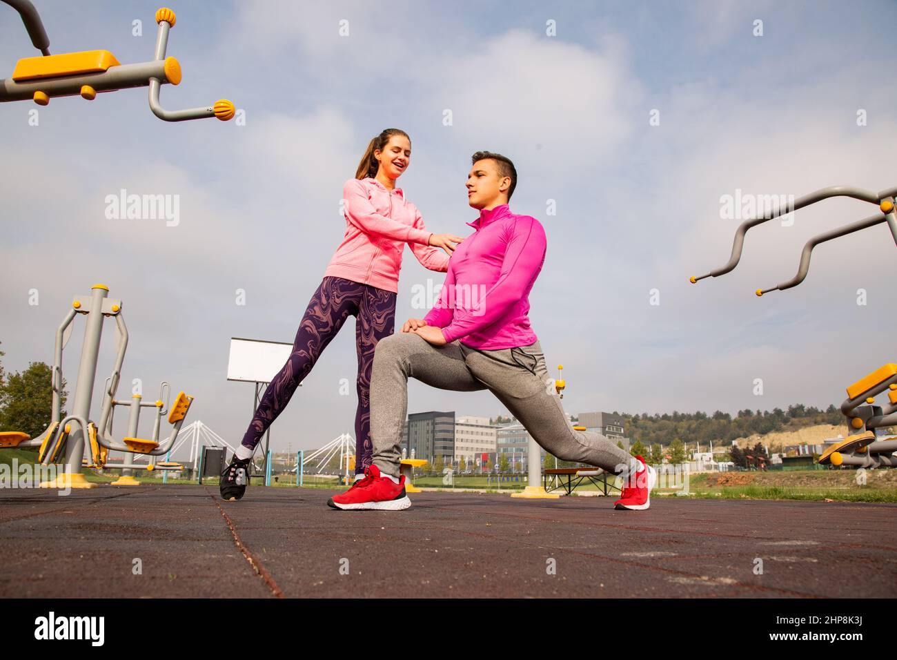 Amazing couple warming up hi-res stock photography and images - Alamy