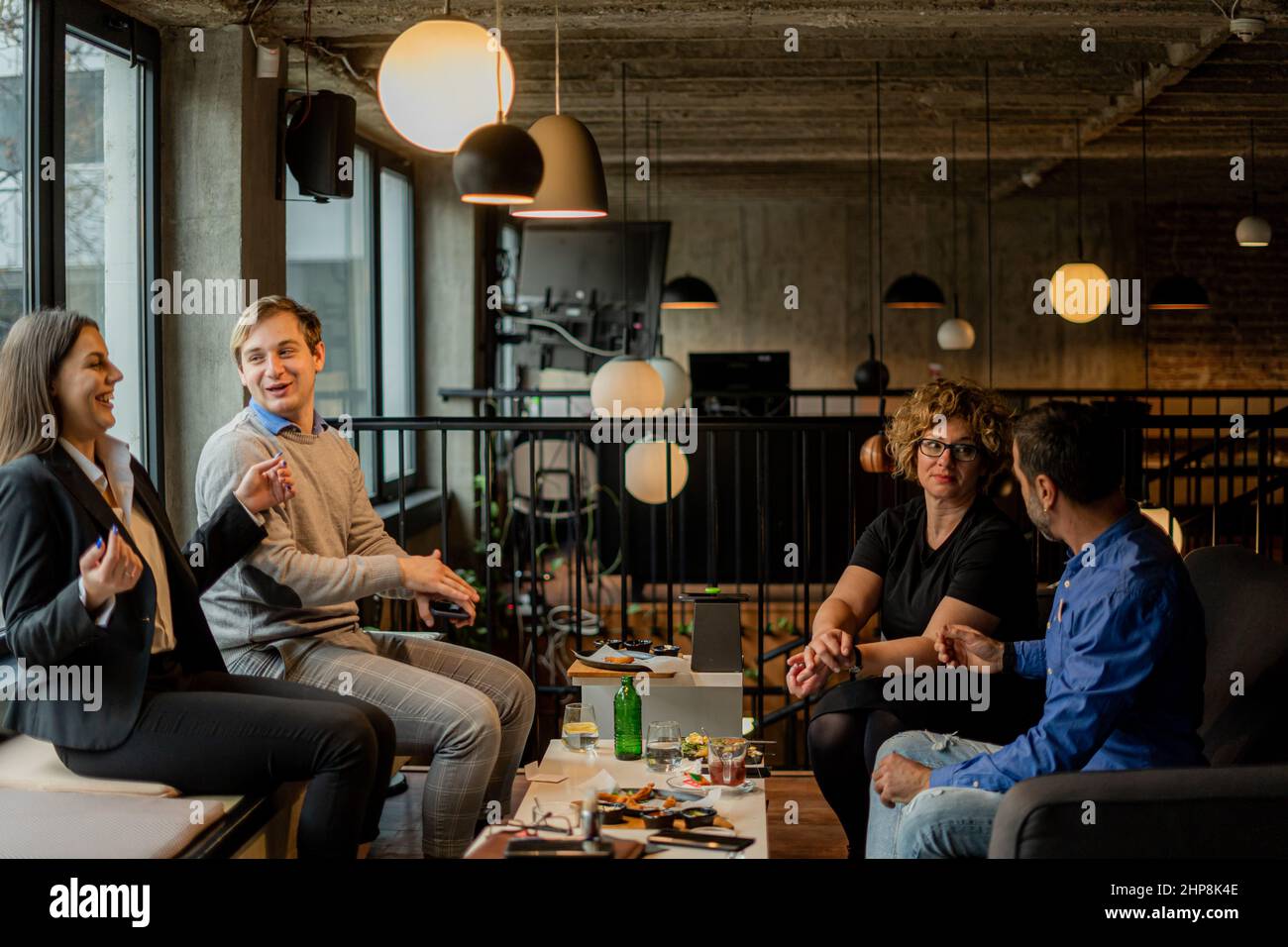 Group of amazing business people are talking and laughing Stock Photo ...