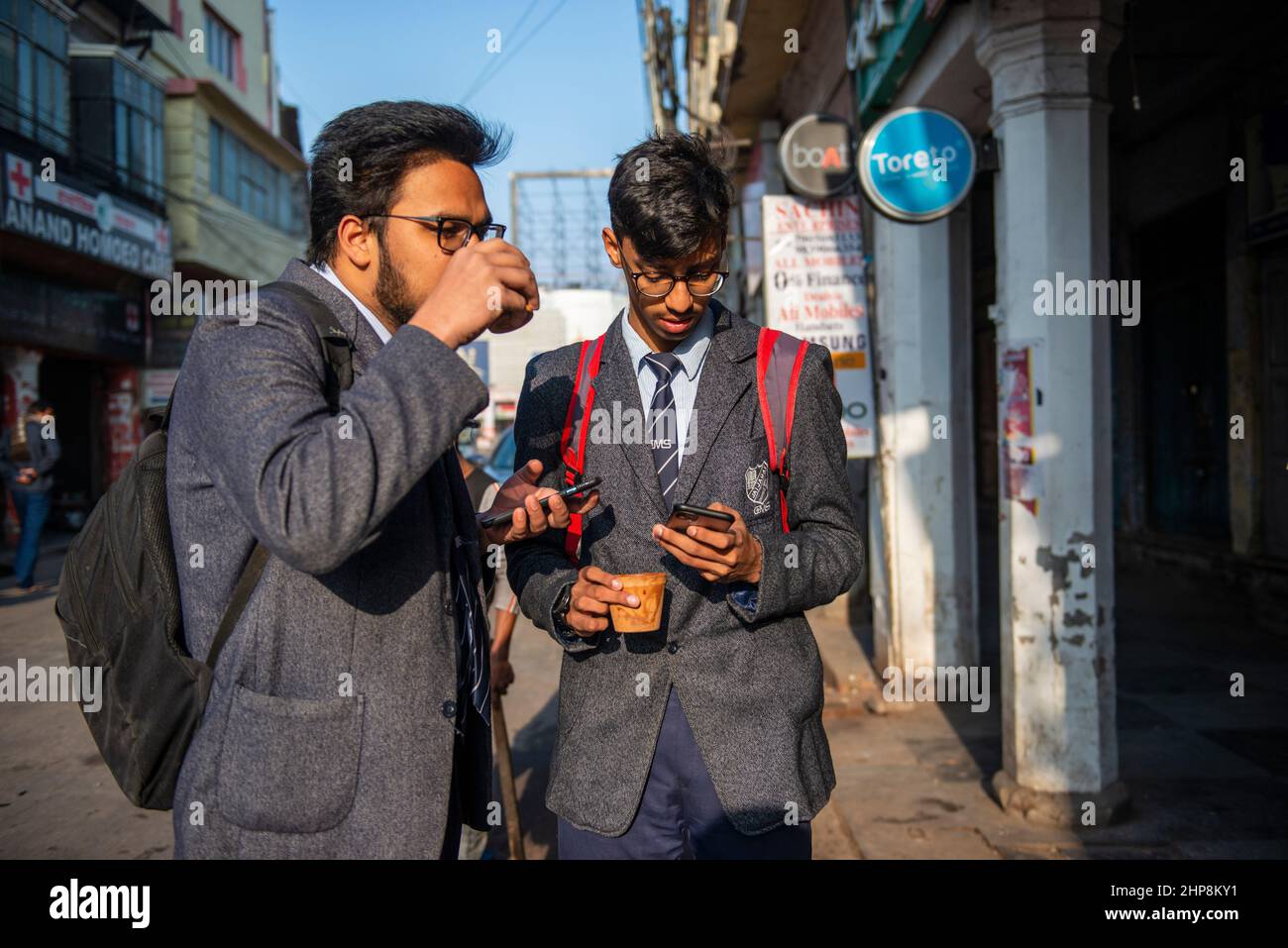 Students sipping kulhad tea at Sharma tea stall in Hazratganj, Lucknow ...