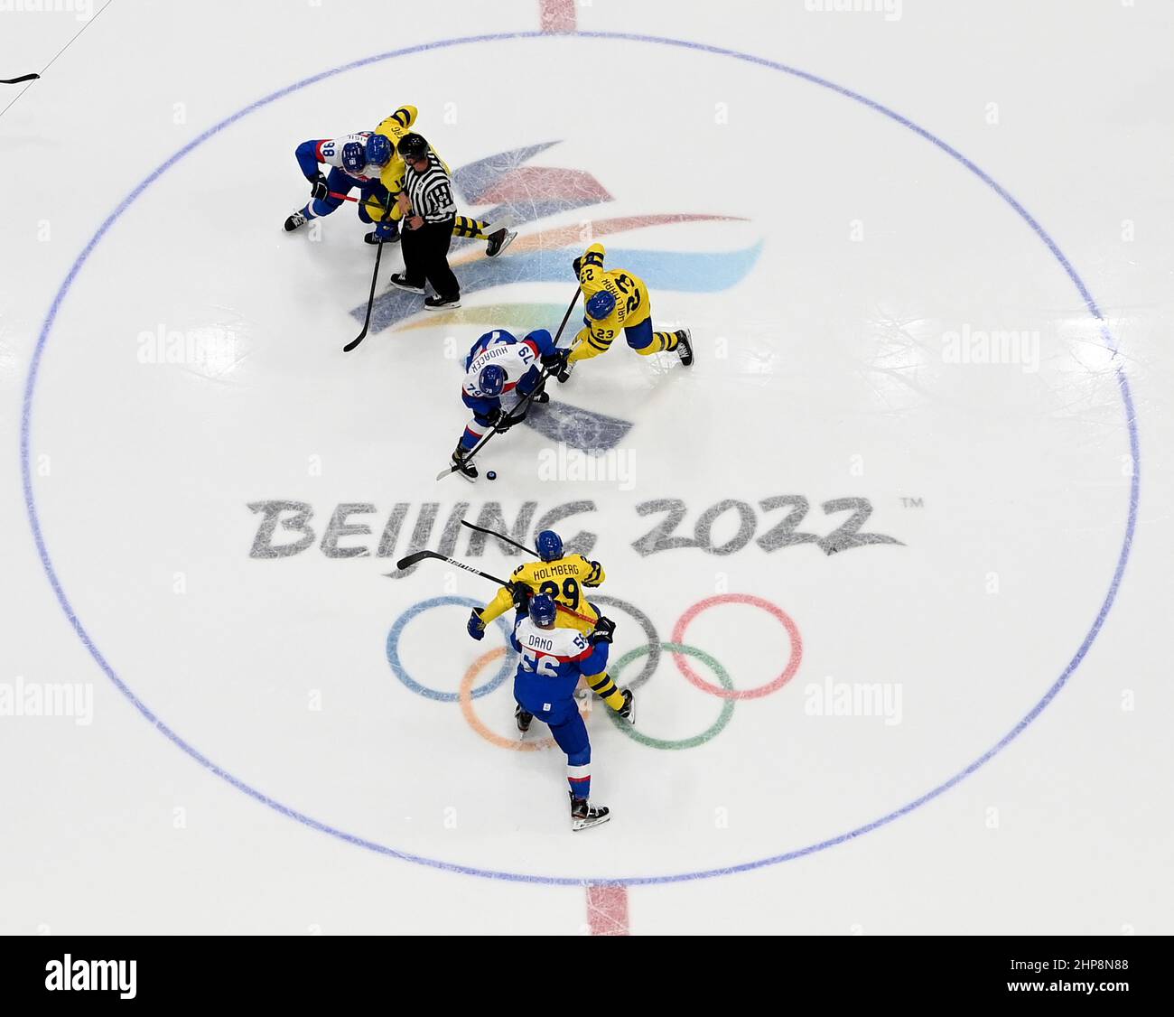 Beijing, China. 19th Feb, 2022. Athletes vie for the puck during the ...