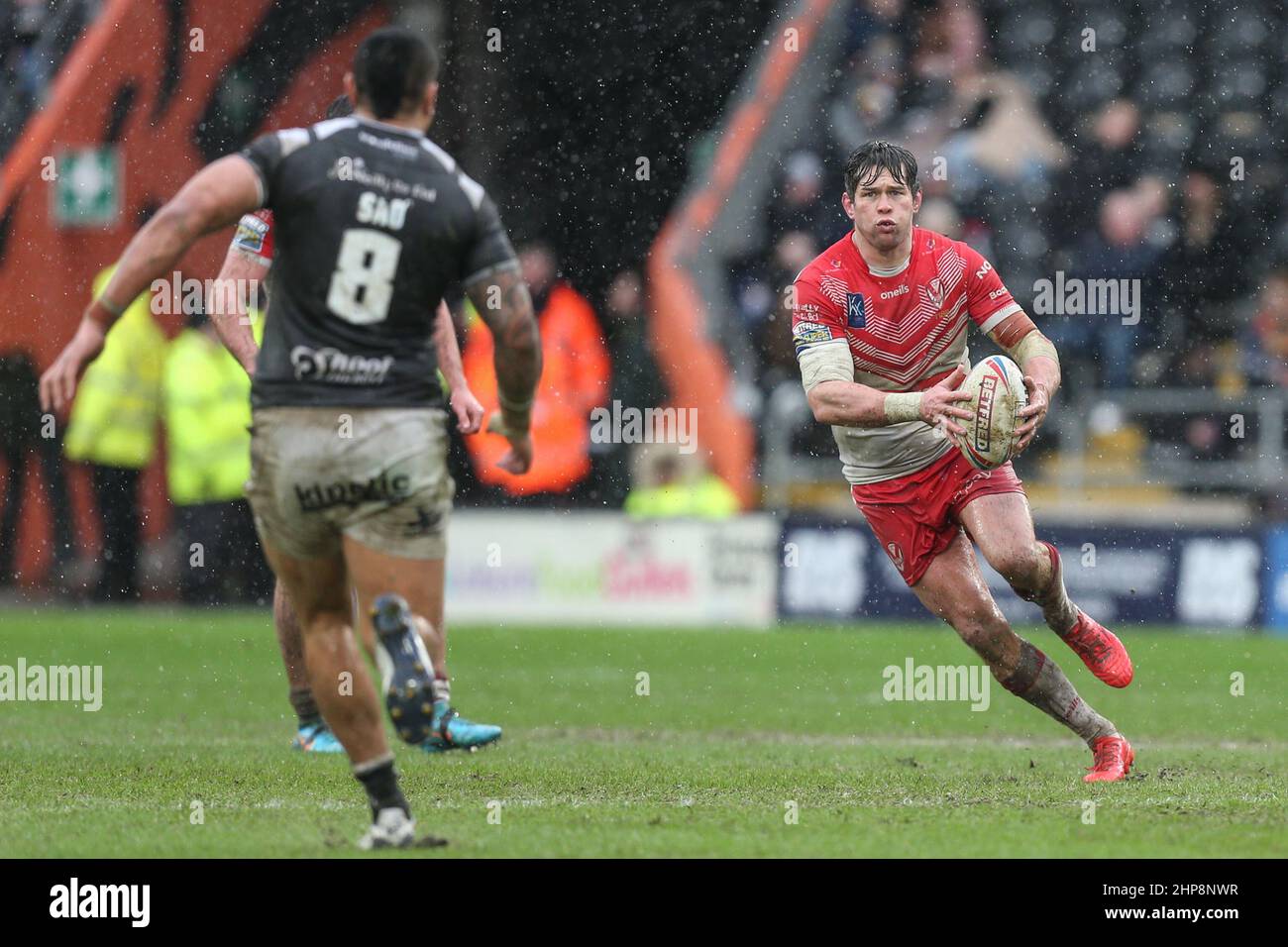 Louie McCarthy-Scarsbrook (15) of St Helens runs with the ball Stock ...