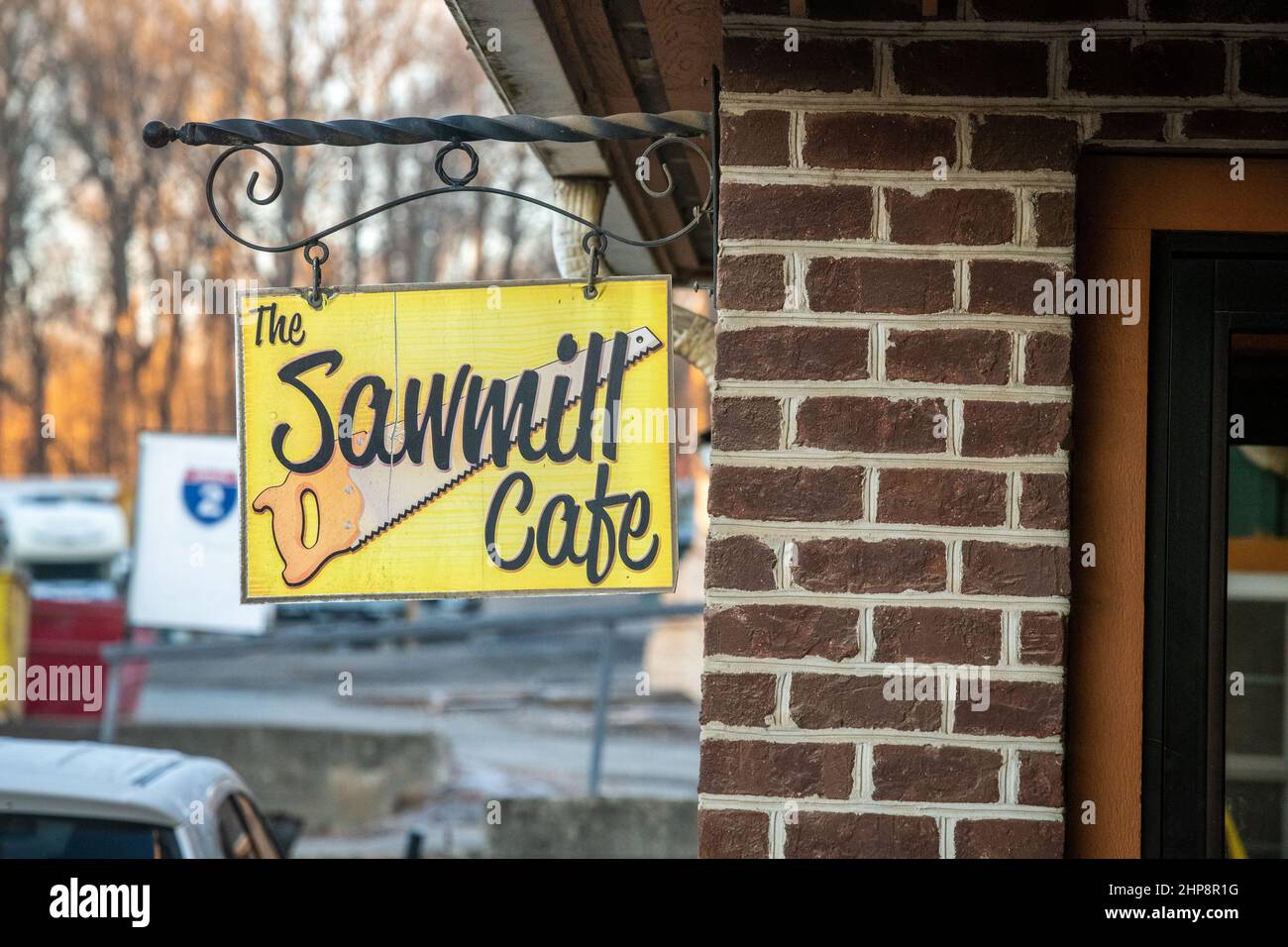 Sign for cafe located inside sawmill Stock Photo - Alamy