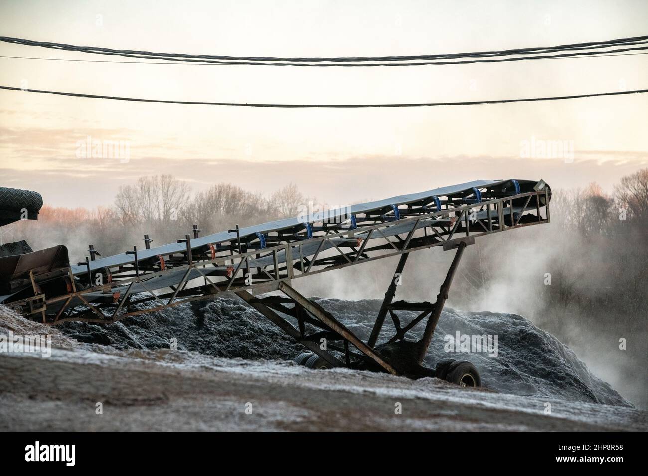 Steam coming off pile of mulch in the early morning Stock Photo - Alamy