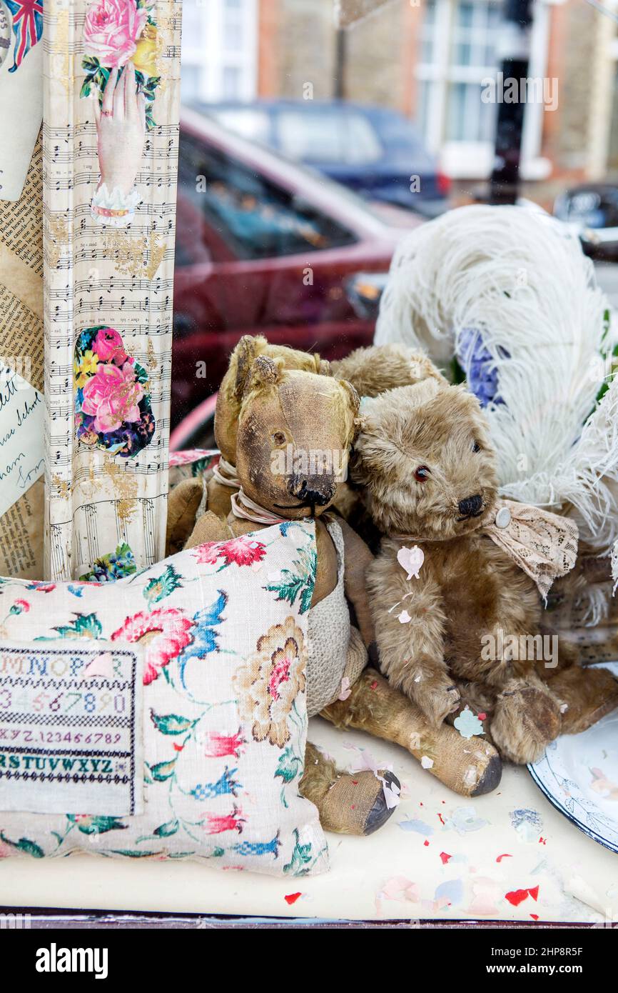London, UK - 17 July 2019, Two old vintage teddy bear on the display on ...
