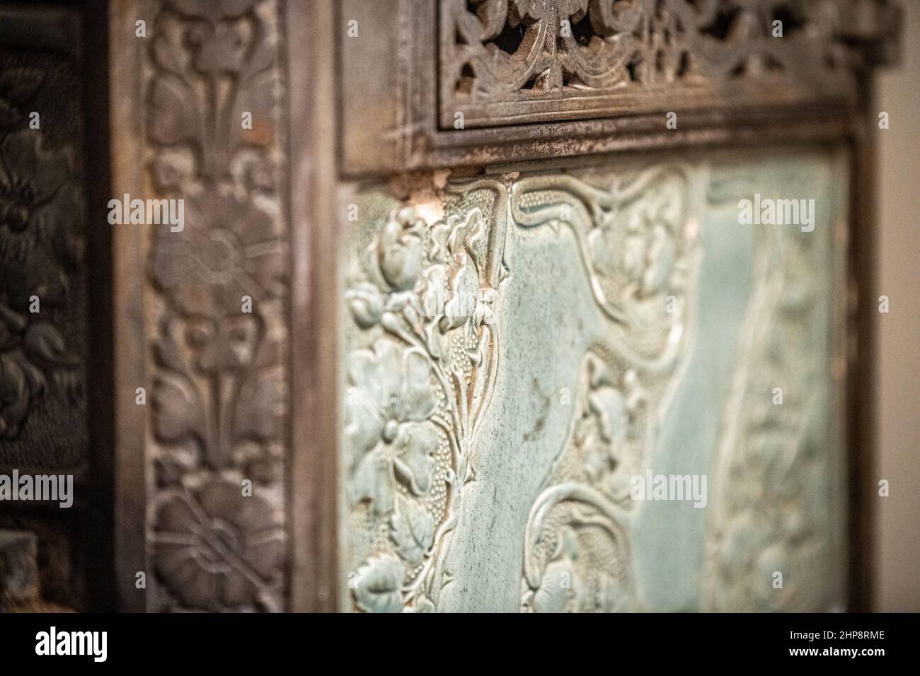 Details of metal decorative elements on pellet stove Stock Photo - Alamy
