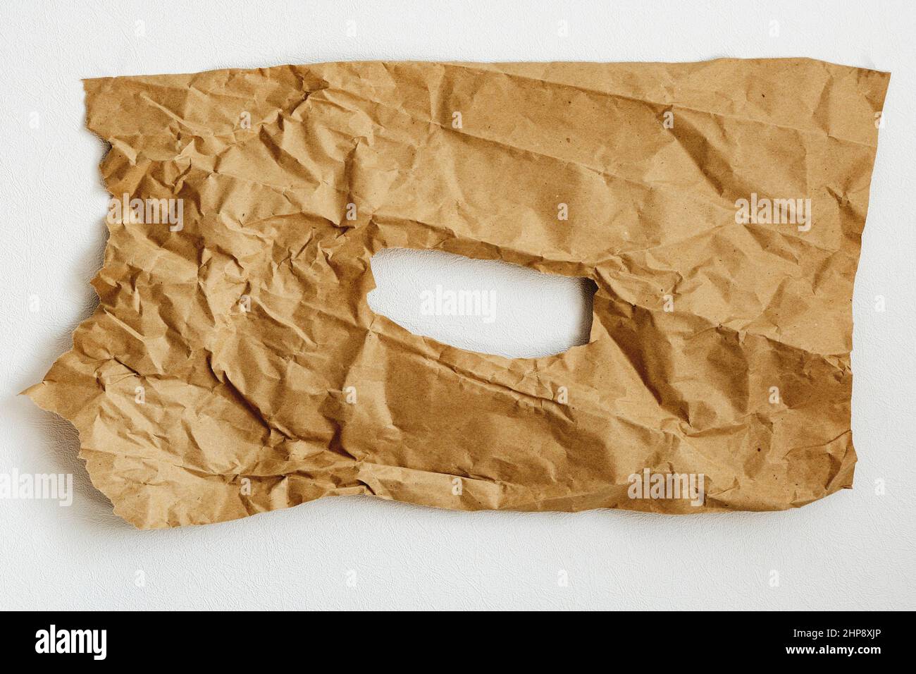 hole in paper with color paper background inside. Good paper texture ...