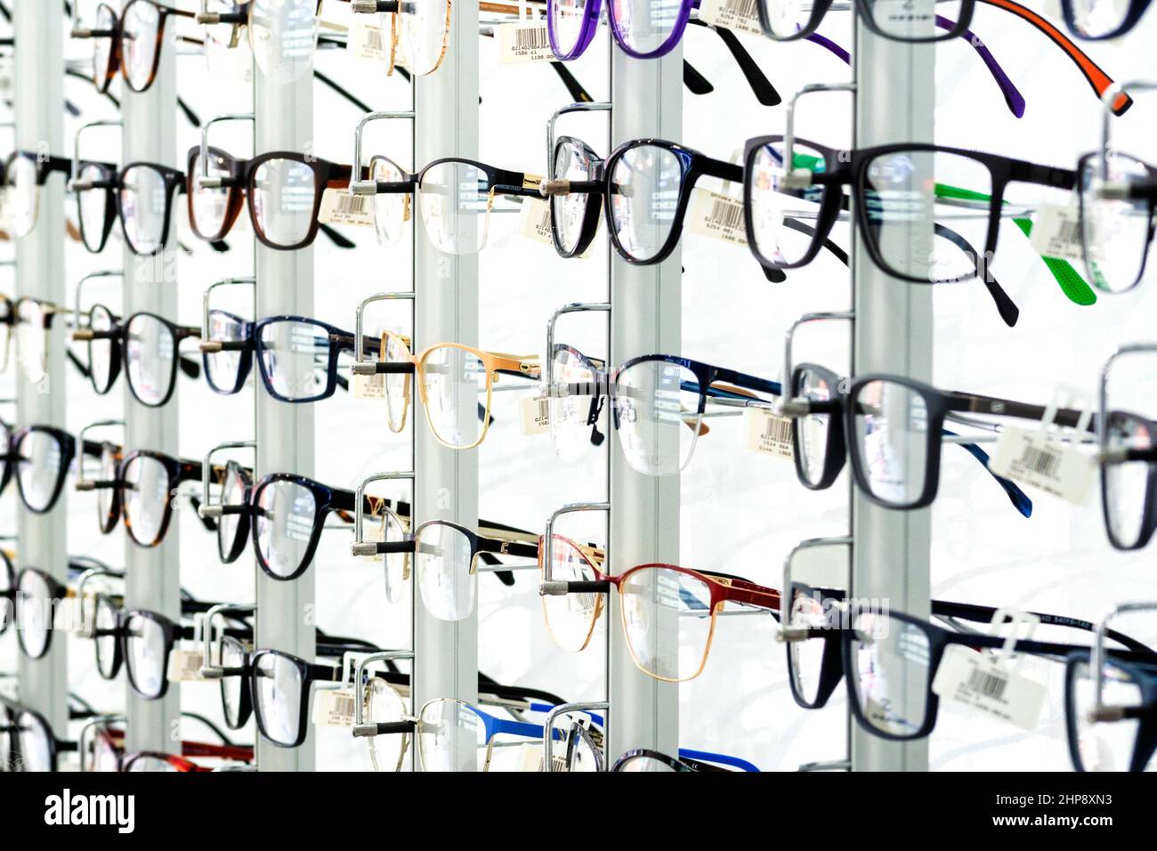 row of glasses. Many color spectacles. Many different glasses on ...