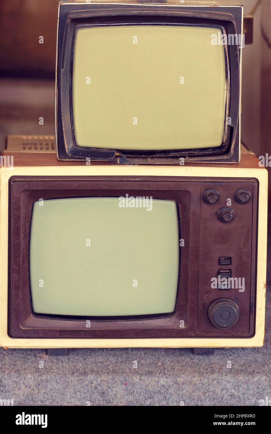 Many retro television. vintage old TV is colorful multi-row. Seeing the ...