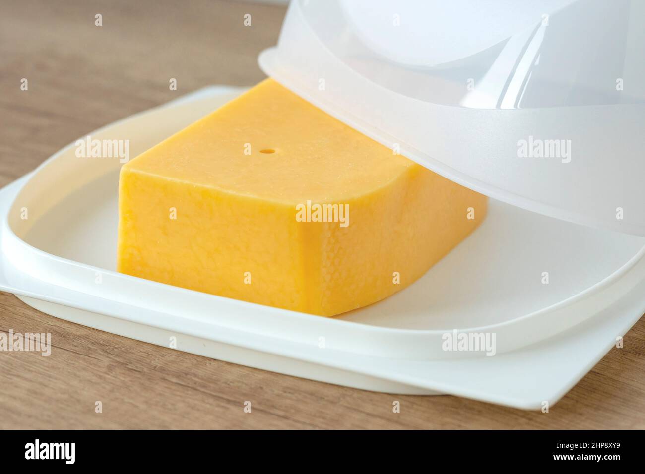 cheese pan.Cheese storage item. Concept of storing cheese in the ...