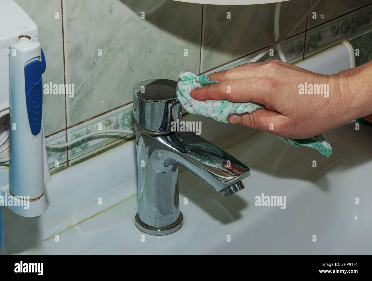 The process of daily cleaning the sink with washing powder and ...