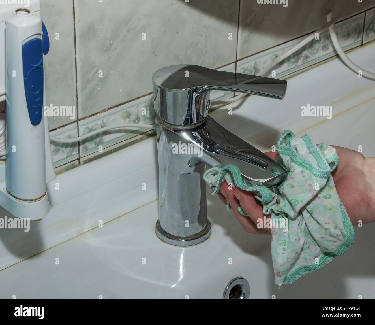 The process of daily cleaning the sink with washing powder and ...