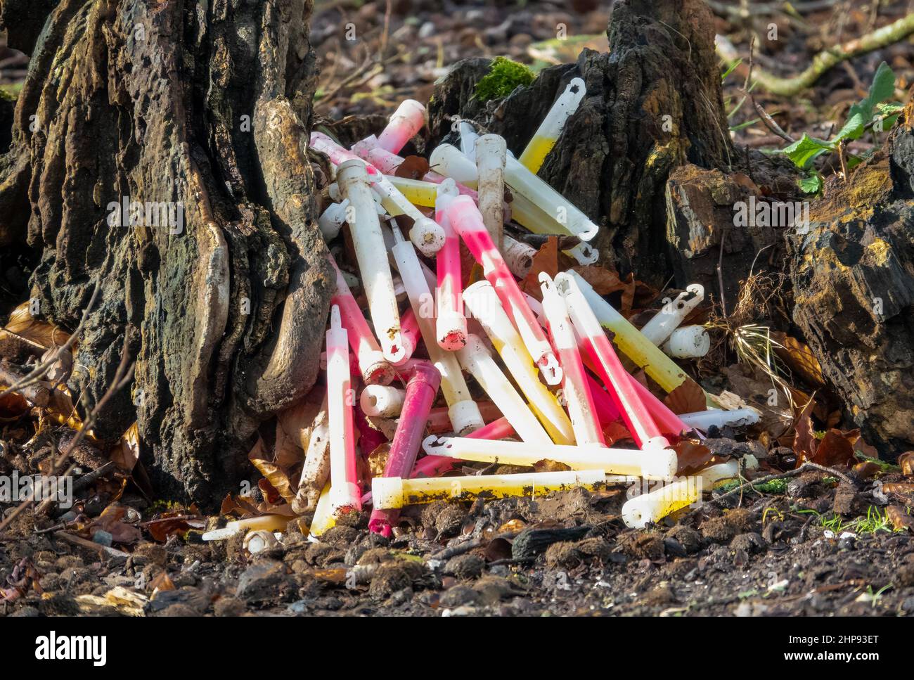 close up of a collection of used army chem glow light sticks after a ...