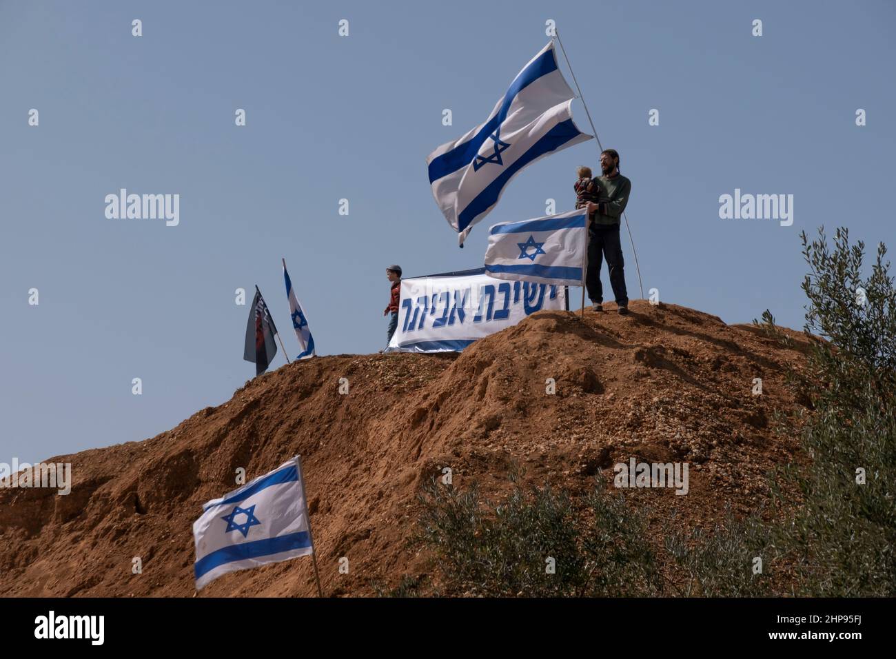Israeli settlers gather during a rally in support of reestablishing the ...
