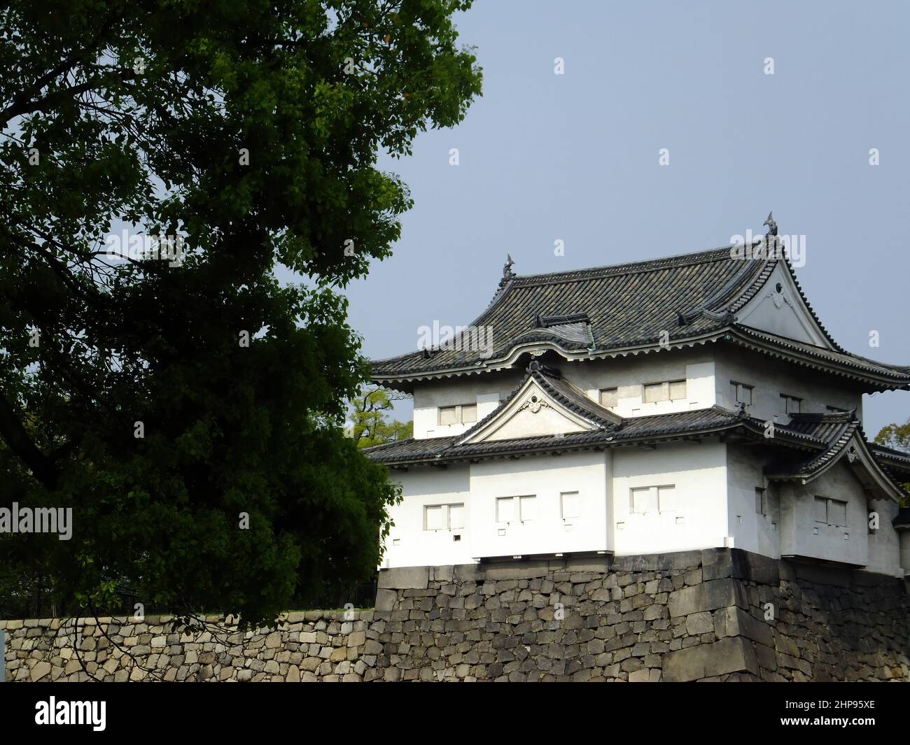 Sunny view of the moat of Osaka Castle at Osaka, Japan Stock Photo - Alamy