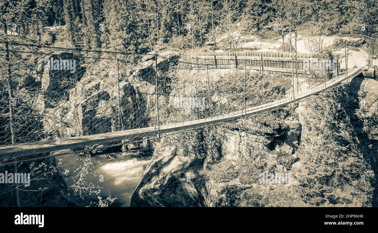 Old black and white picture of the beautiful suspension hanging bridge ...