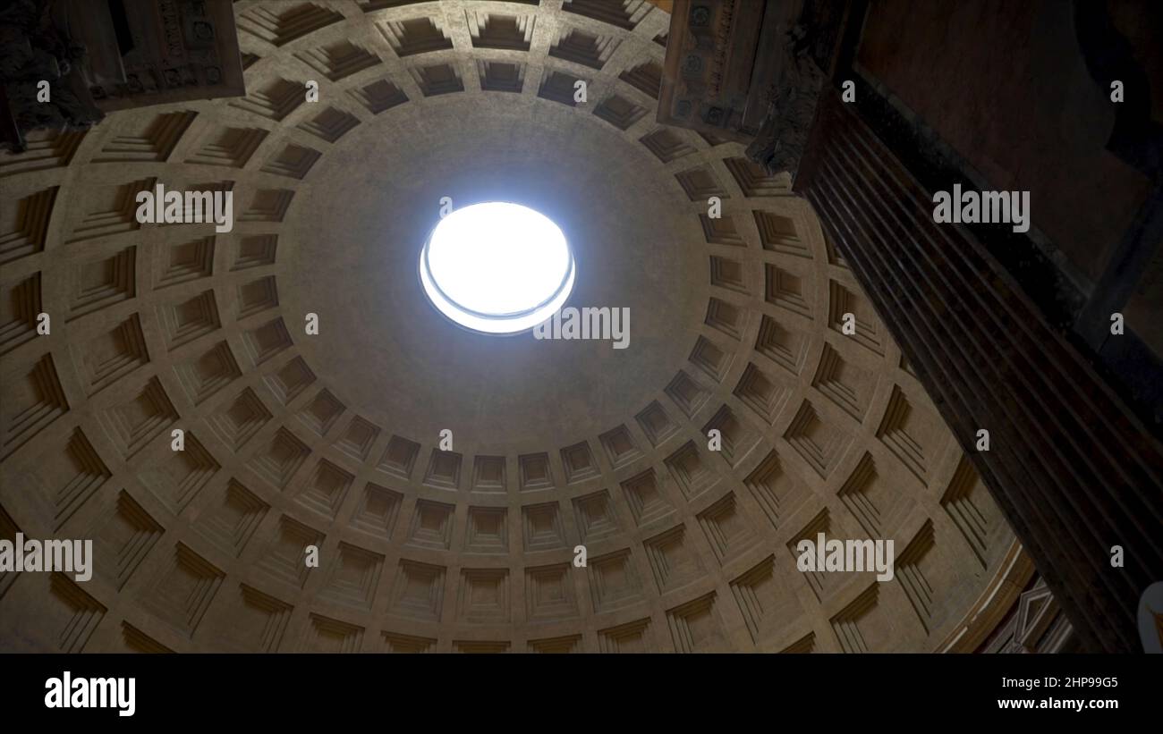 Temple indoor interior with dome round window and the bright light ...