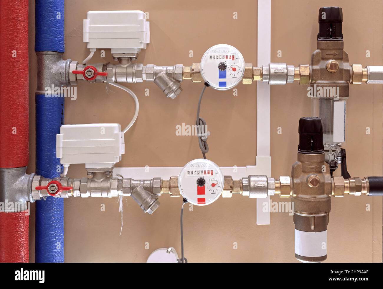 Water meters in the plumbing system. Water flow measurement Stock Photo ...