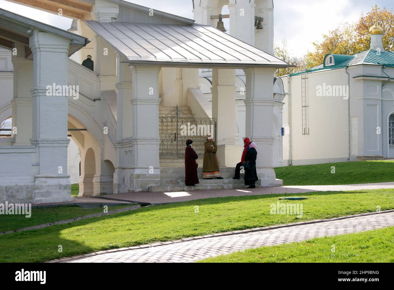 Female museum and tour guides wearing ornate historical Russian ...