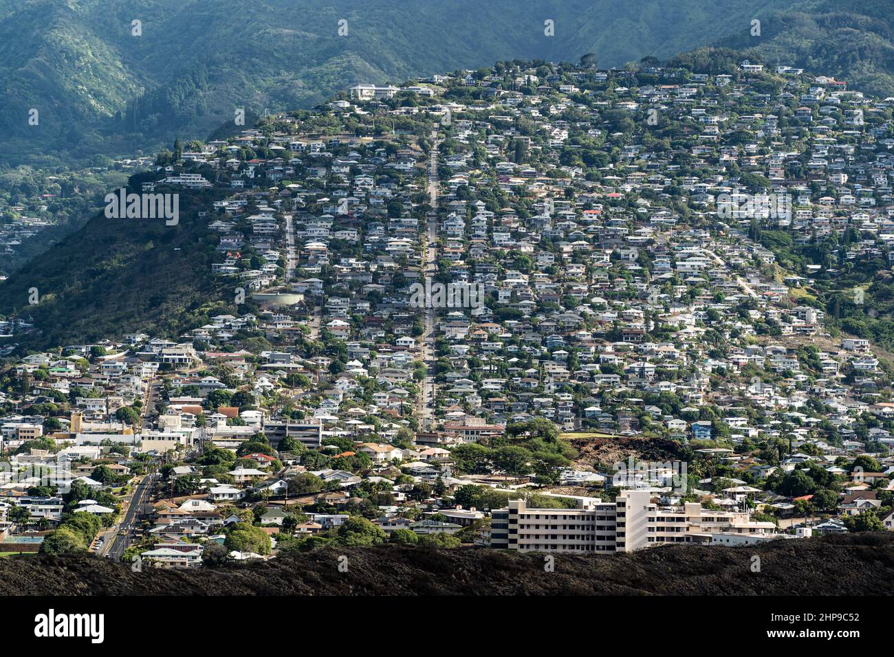 Aerial view of city on a hill with buildings and green nature Stock ...