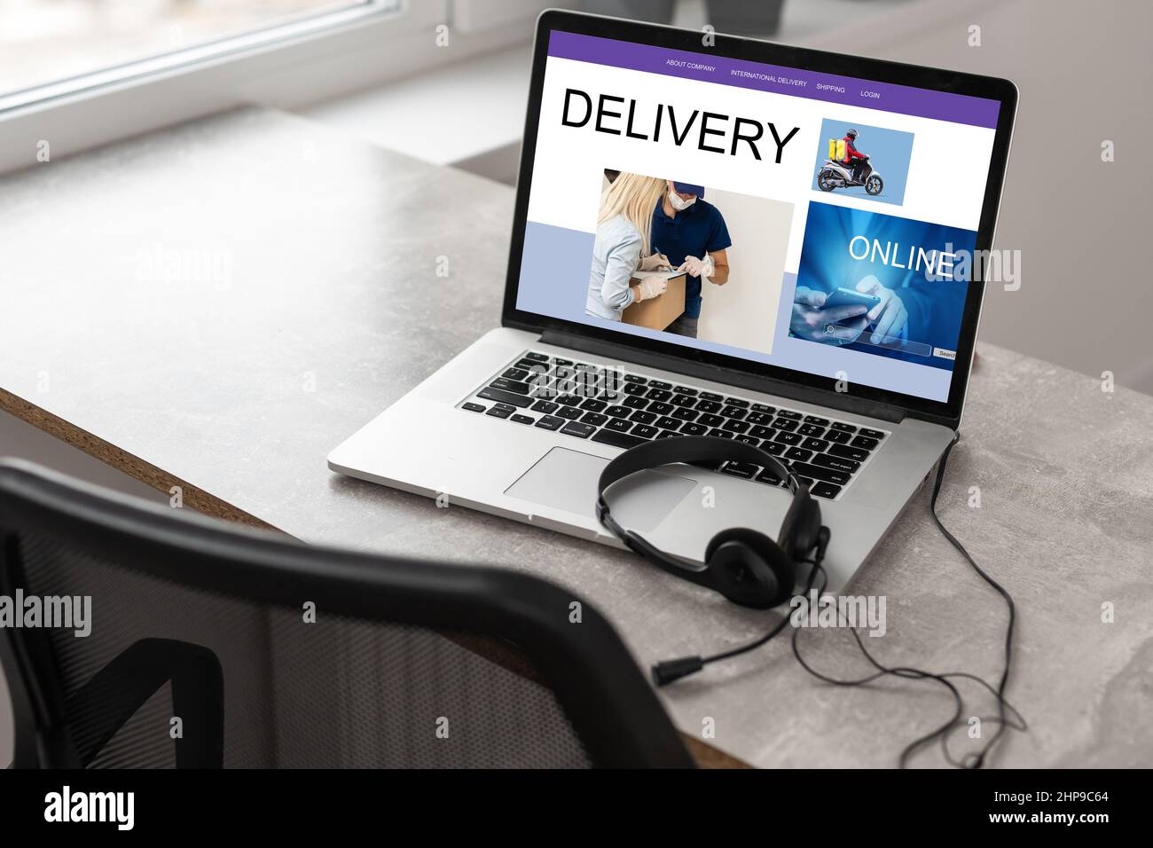 Laptop screen displaying a delivery tracking concept Stock Photo - Alamy