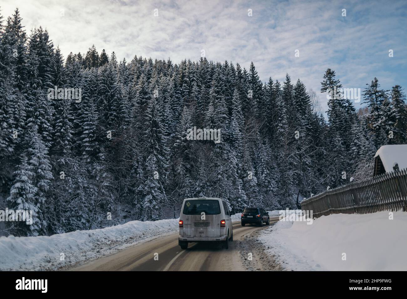 A snow covered road travel Stock Photo - Alamy