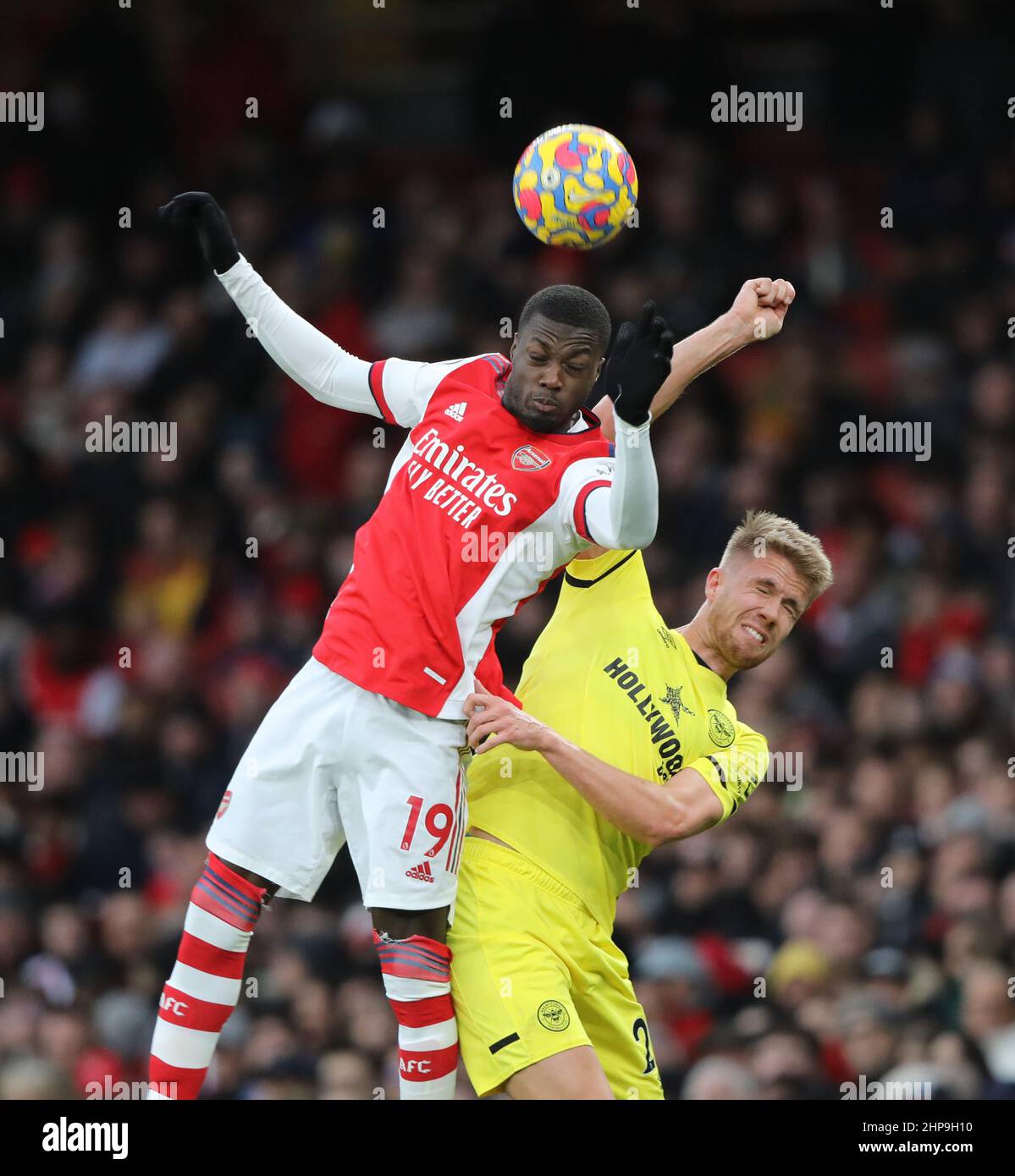 London, UK. 19th Feb, 2022. Nicolas Pepe (A) Kristoffer Ajer (B) at the ...