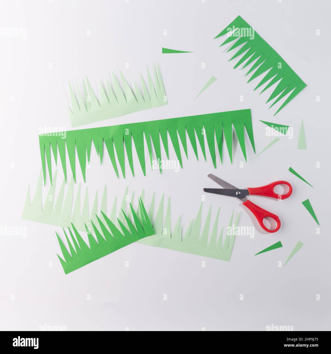 green paper grass craft, DIY instructions, recycling concept Stock ...