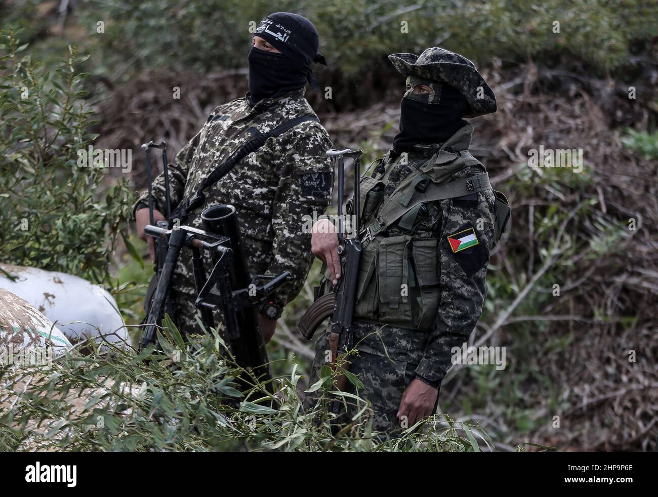 Armed soldiers of the Mujahideen Brigades seen next to a Missile ...