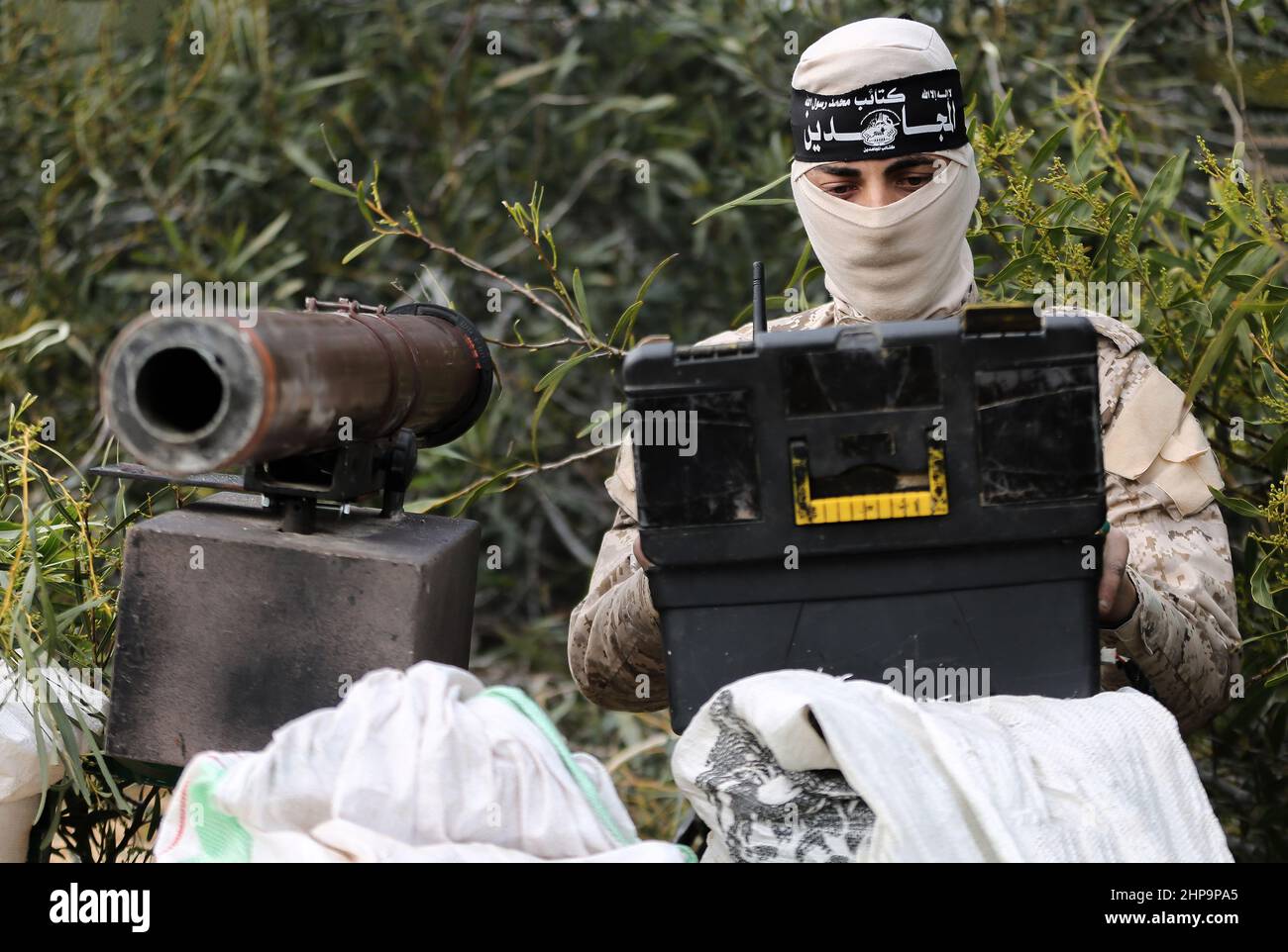 An armed soldier of the Mujahideen Brigades seen with a missile ...