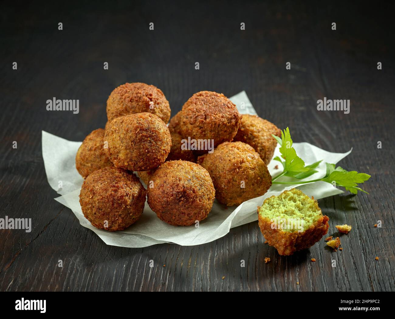 fried organic falafel balls on black wooden table, halafel Stock Photo ...