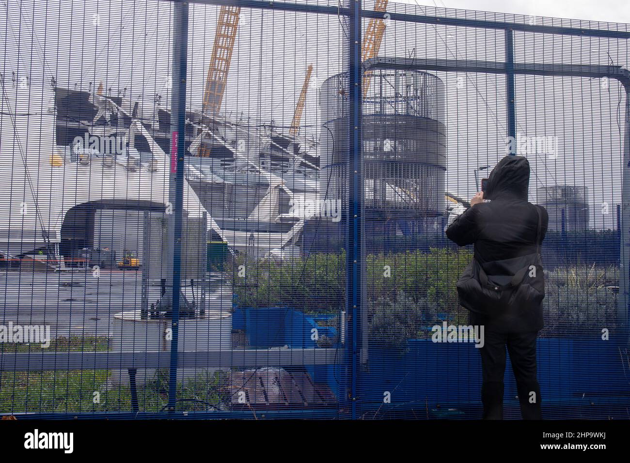 LONDON, FEBRUARY 19 2022, A pedestrain takes a photo as London’s O2 ...