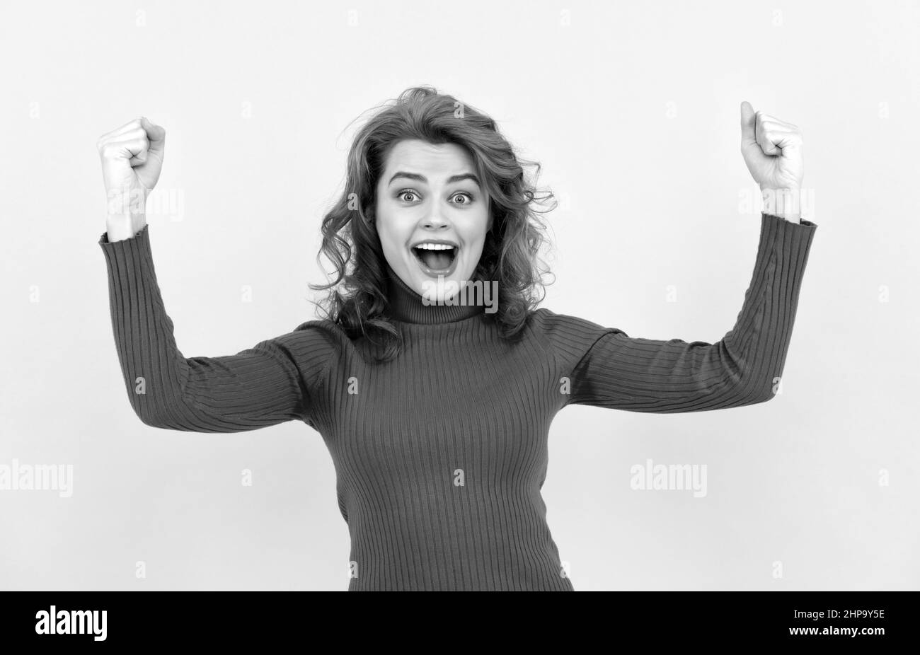 redhead lady celebrating success. finally. happy woman express ...