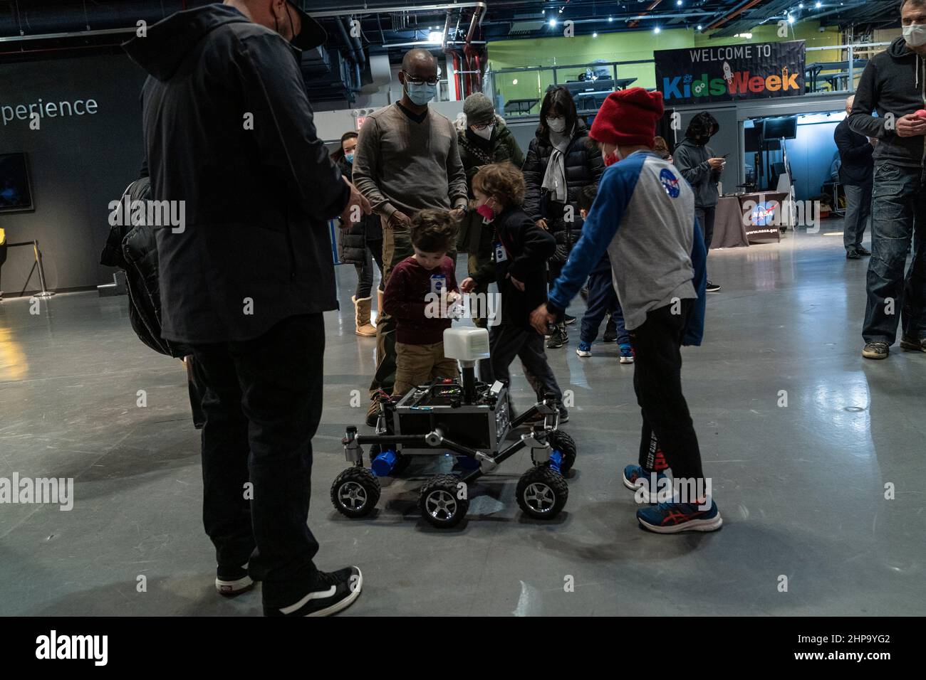 New York, NY - February 19, 2022: Kids play with robotic replica of ...