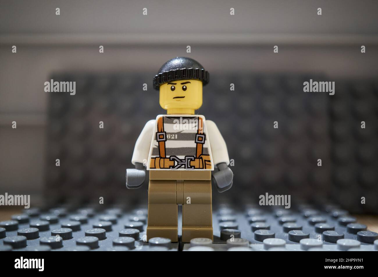 Lego prisoner figurine standing on a board Stock Photo - Alamy