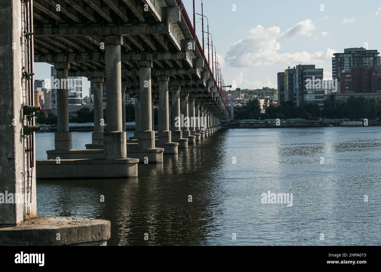 Railway bridge over the river in summer. New bridge across the Dnieper ...