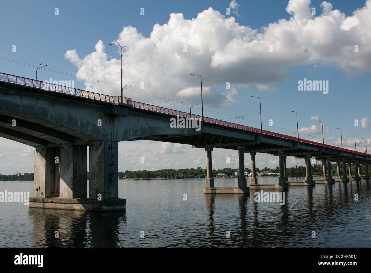 Railway bridge over the river in summer. New bridge across the Dnieper ...