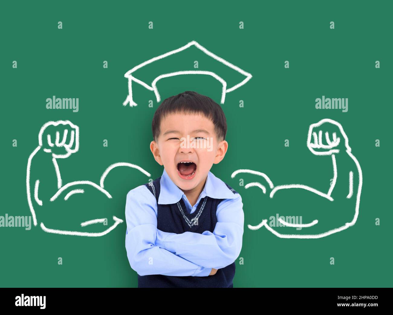 Strong kid in graduation cap with muscles on chalkboard background ...
