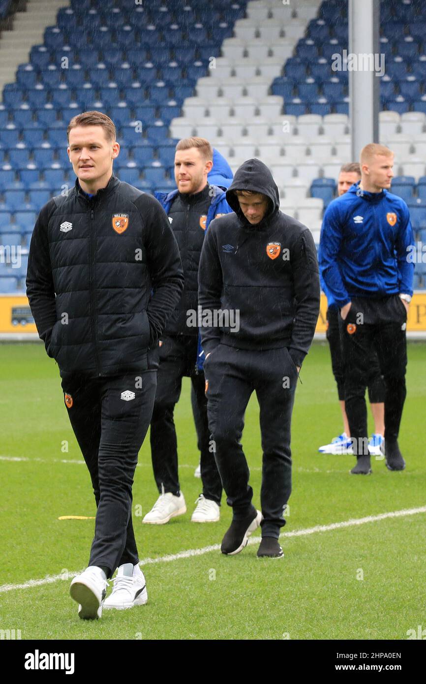 London, UK. 19th Feb, 2022. Sean McLoughlin #17 of Hull City with Keane ...