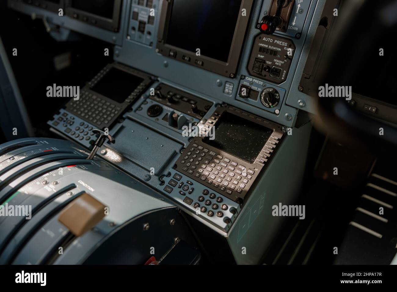Airplane cockpit with flight displays, switches and knobs Stock Photo ...