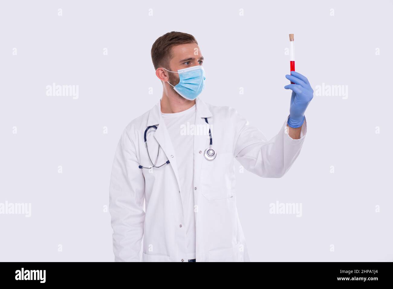 Man Doctor Holding Blood Tube Analysis Wearing Medical Mask And Gloves ...