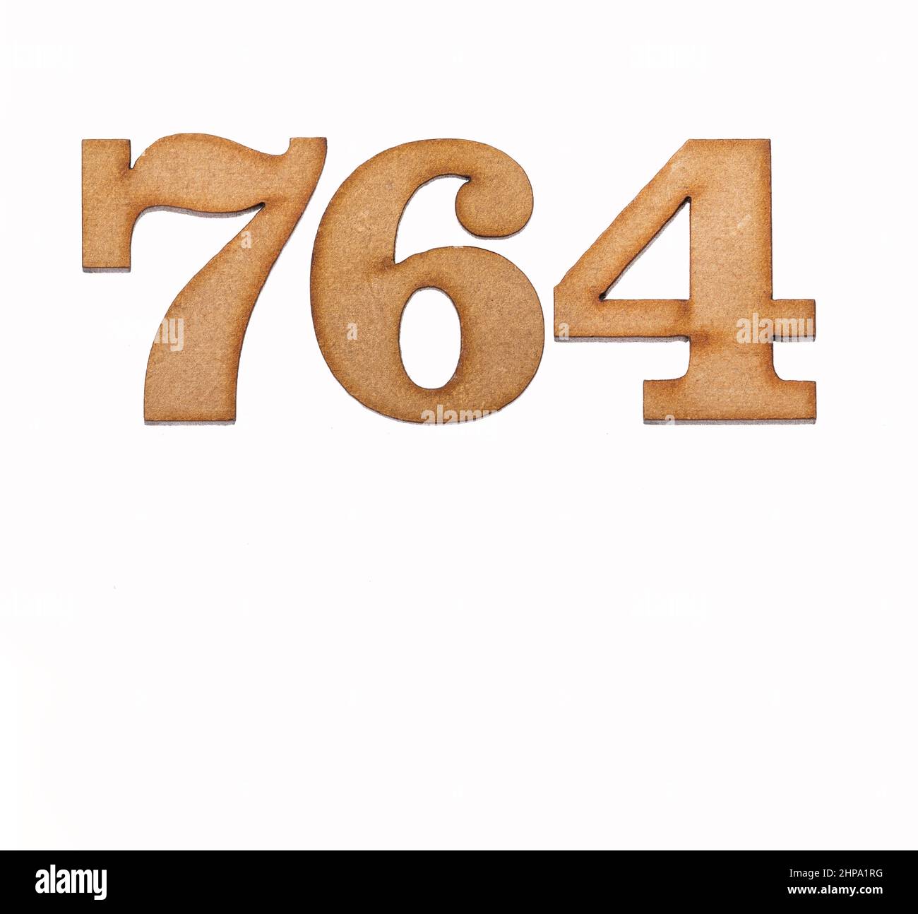 Number 764 - Piece of wood isolated on white background Stock Photo - Alamy
