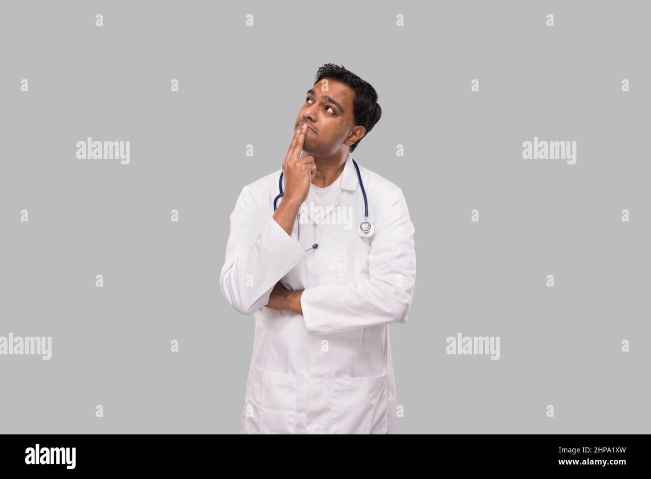 Indian Man Doctor Thinking Sign. Doctor Watching Up. Isolated Stock ...