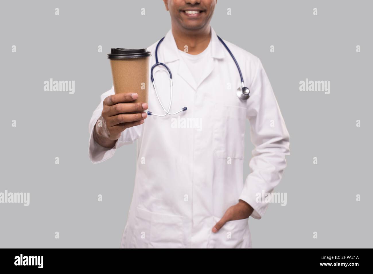 Doctor Holding Coffee Take Away Cup Smiling Isolated. Indian Man Doctor ...