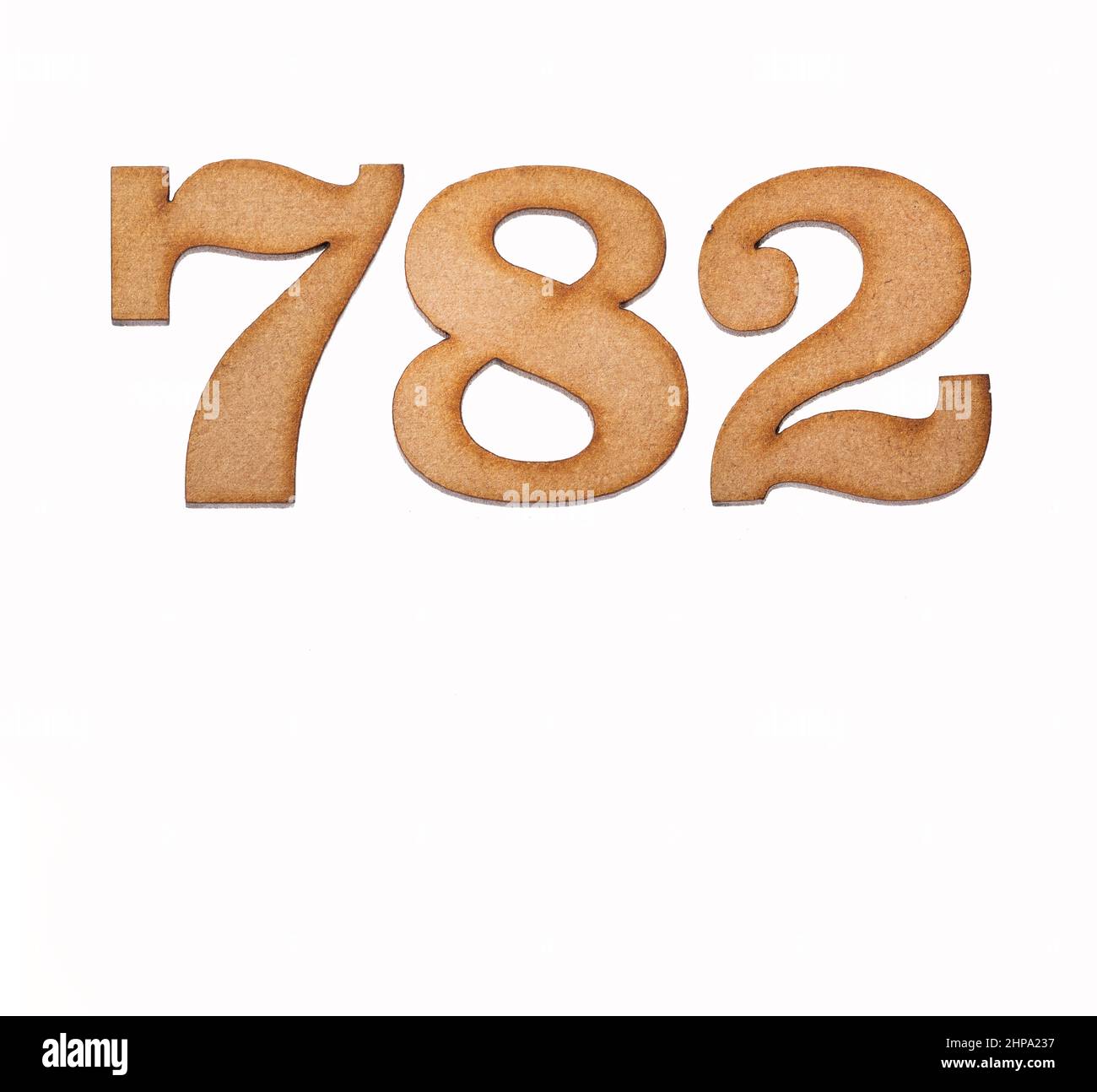 Number 782 - Piece of wood isolated on white background Stock Photo - Alamy