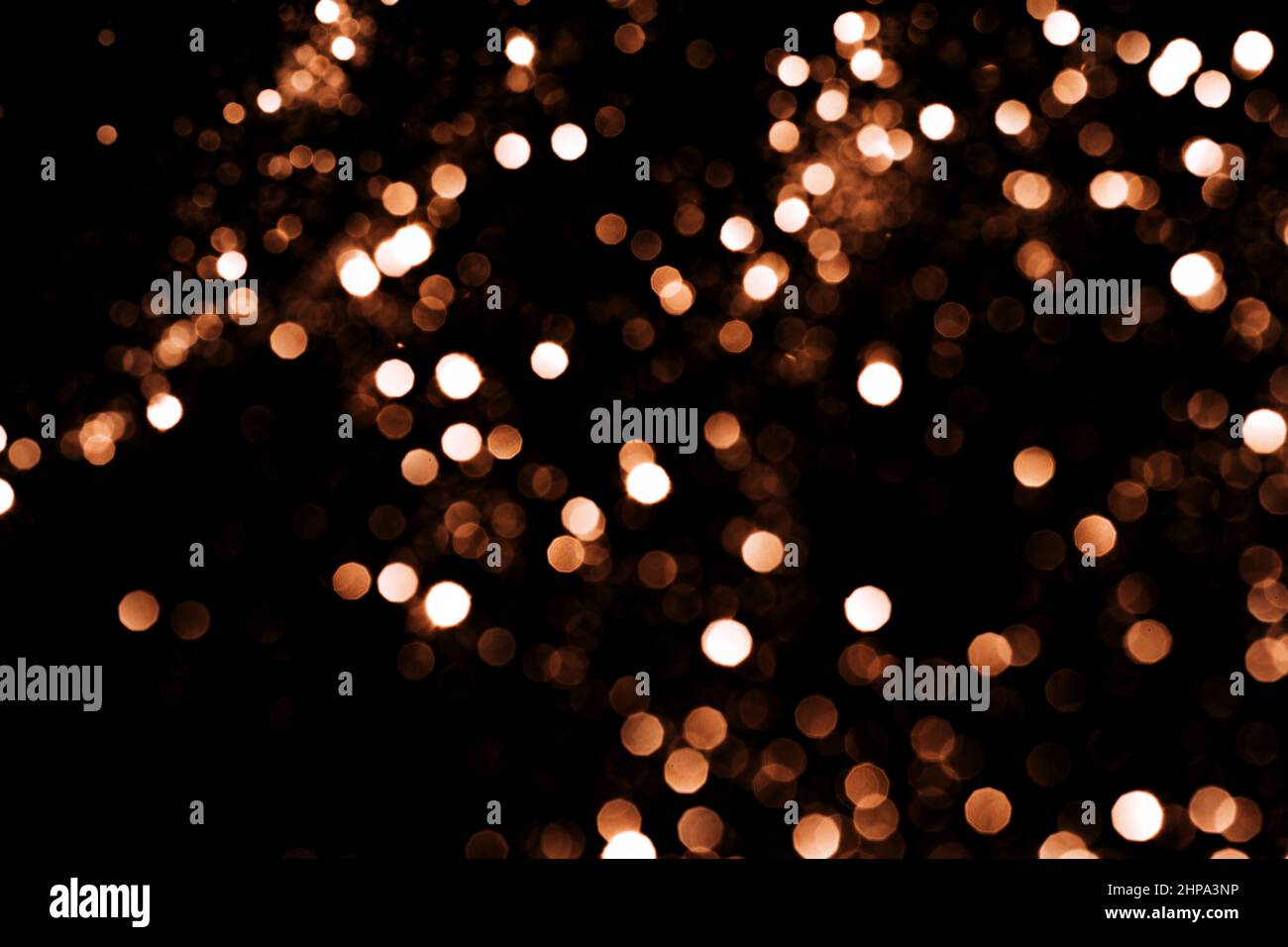 Floating lights against a black background Stock Photo - Alamy