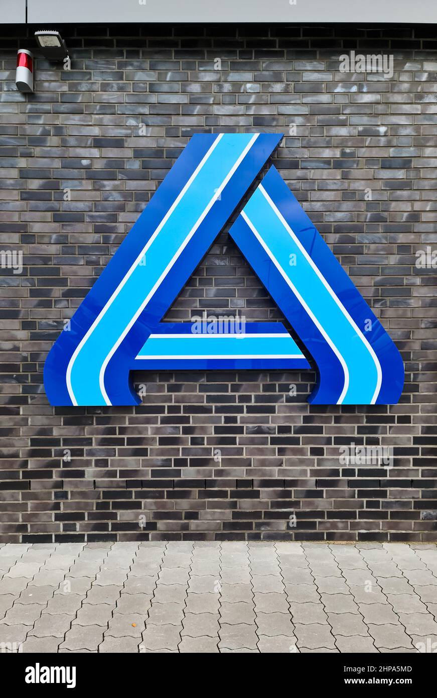 Large blue logo of the discount chain Aldi on a wall of a supermarket ...