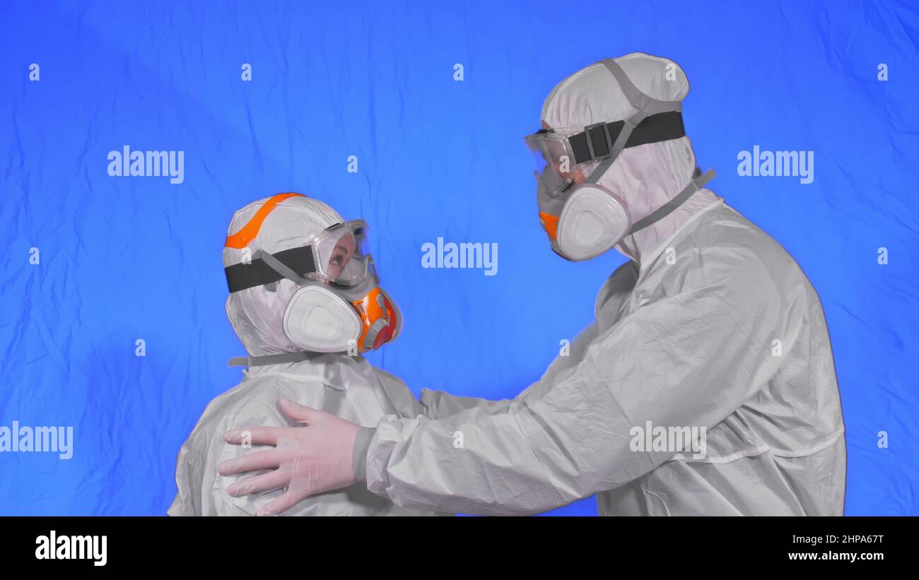 Doctor health worker in respirator. Slow motion. People portrait ...